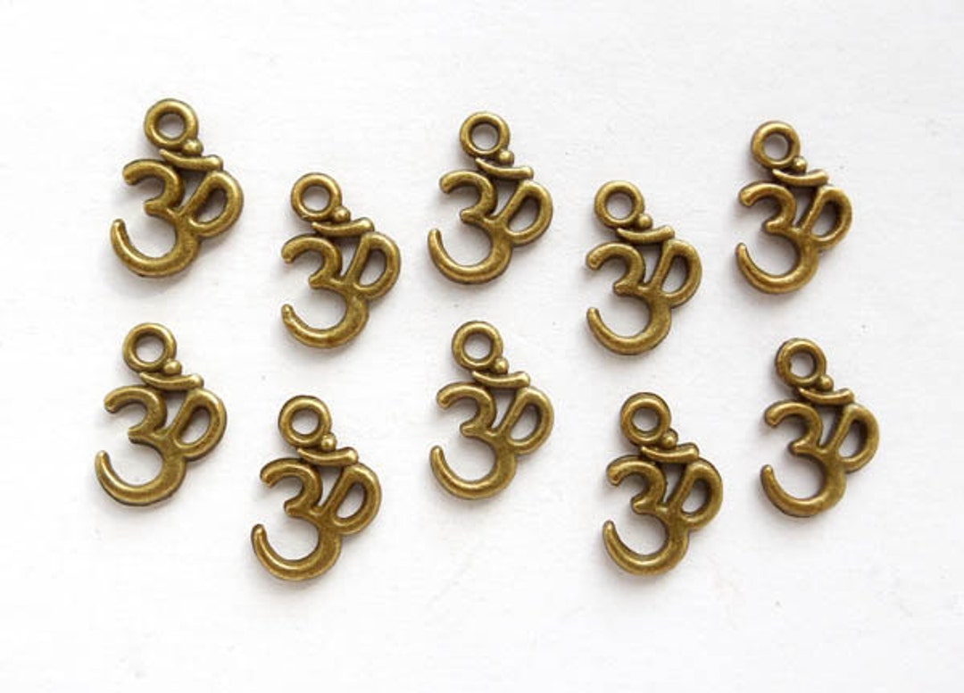 10 Antique Bronze Om Symbol Charms - 27-25-1 - Etsy
