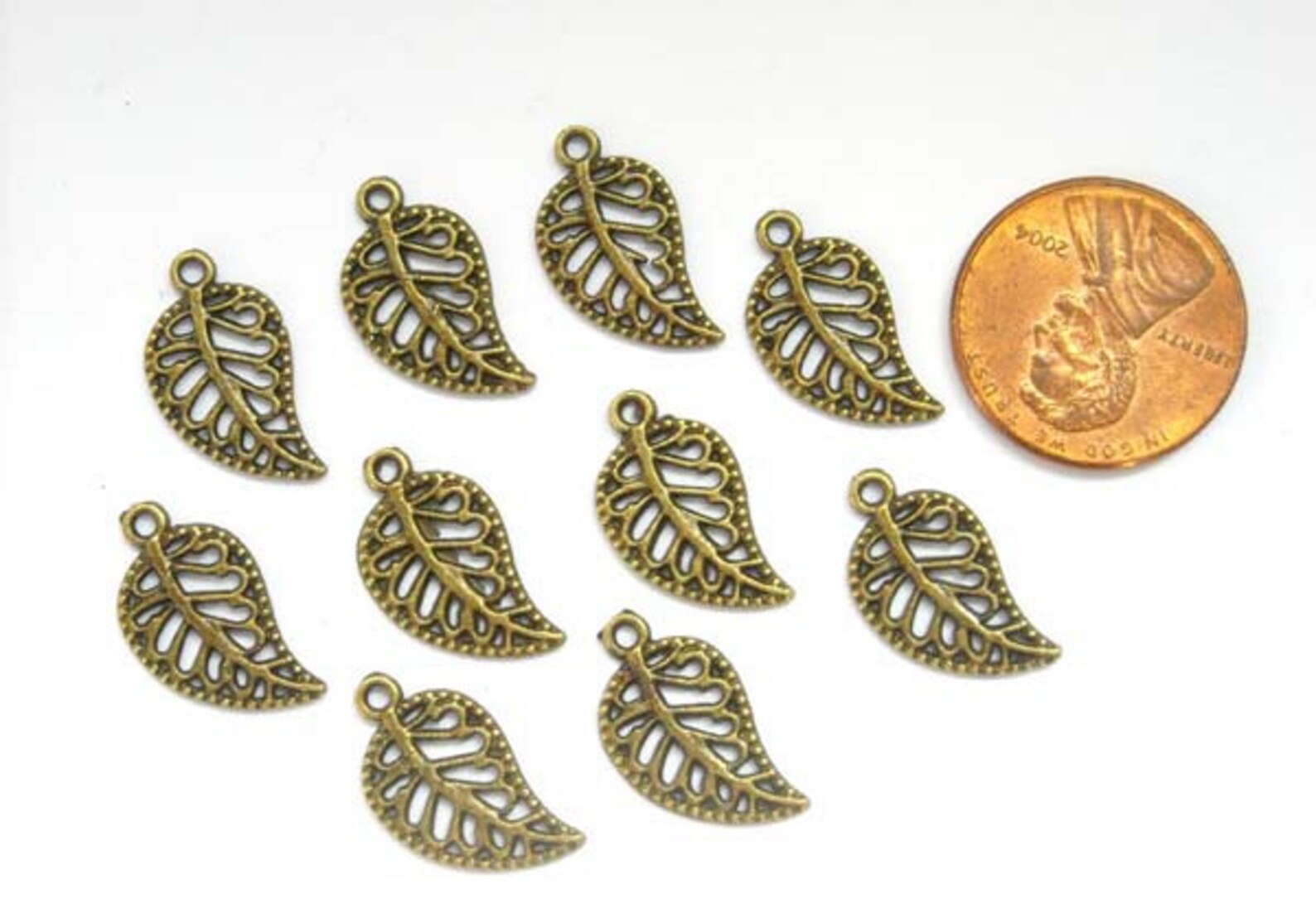 10 Antique Bronze Small Leaf Charms - 21-48-3 - Etsy