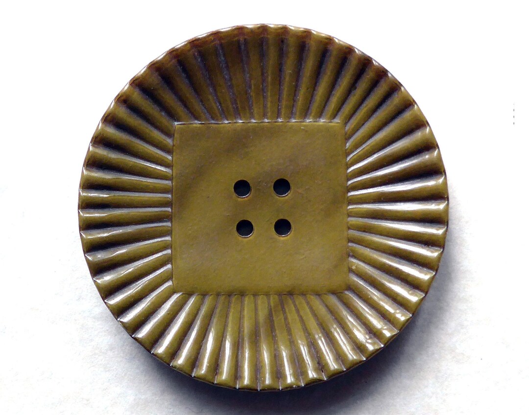 Celluloid Button, Vintage. A Radiating Design With a Central Square ...