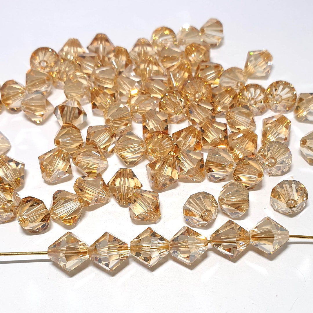 Gorgeous 6mm Golden Shadow Bicone Swarovski Crystals, Faceted Golden ...