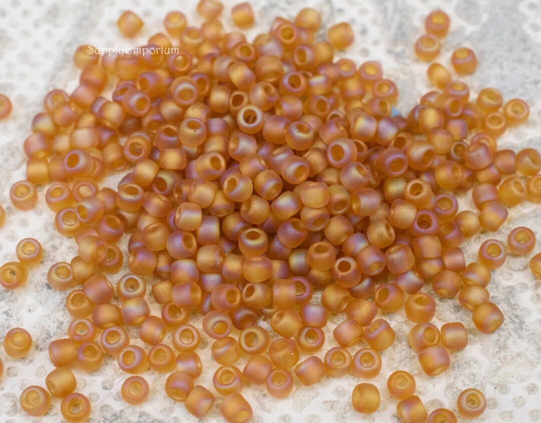 Toho Transparent Rainbow Frosted Dark Topaz Toho 162CF Dark Topaz Toho ...