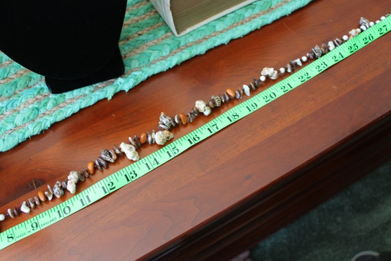 Sea Shells. Hawaiian style. Lei? Homes of tiny sea li… - Gem