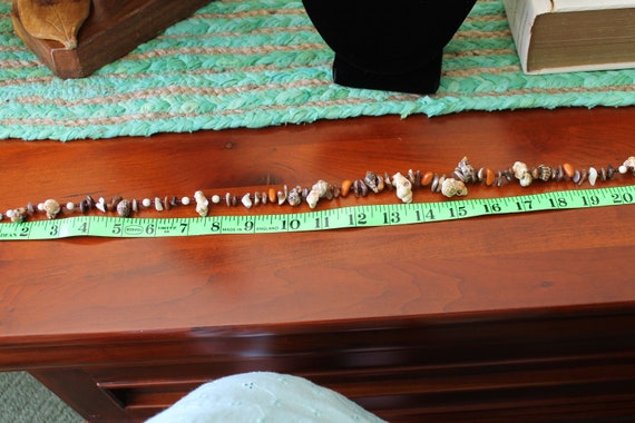 Sea Shells. Hawaiian style. Lei? Homes of tiny sea li… - Gem