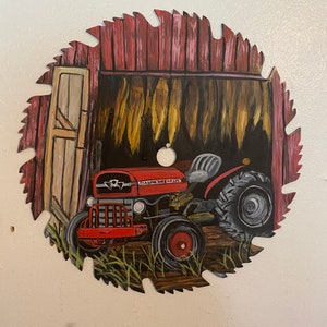 Massey Ferguson Tractor Painting on a Round Sawblade Sitting in Front ...