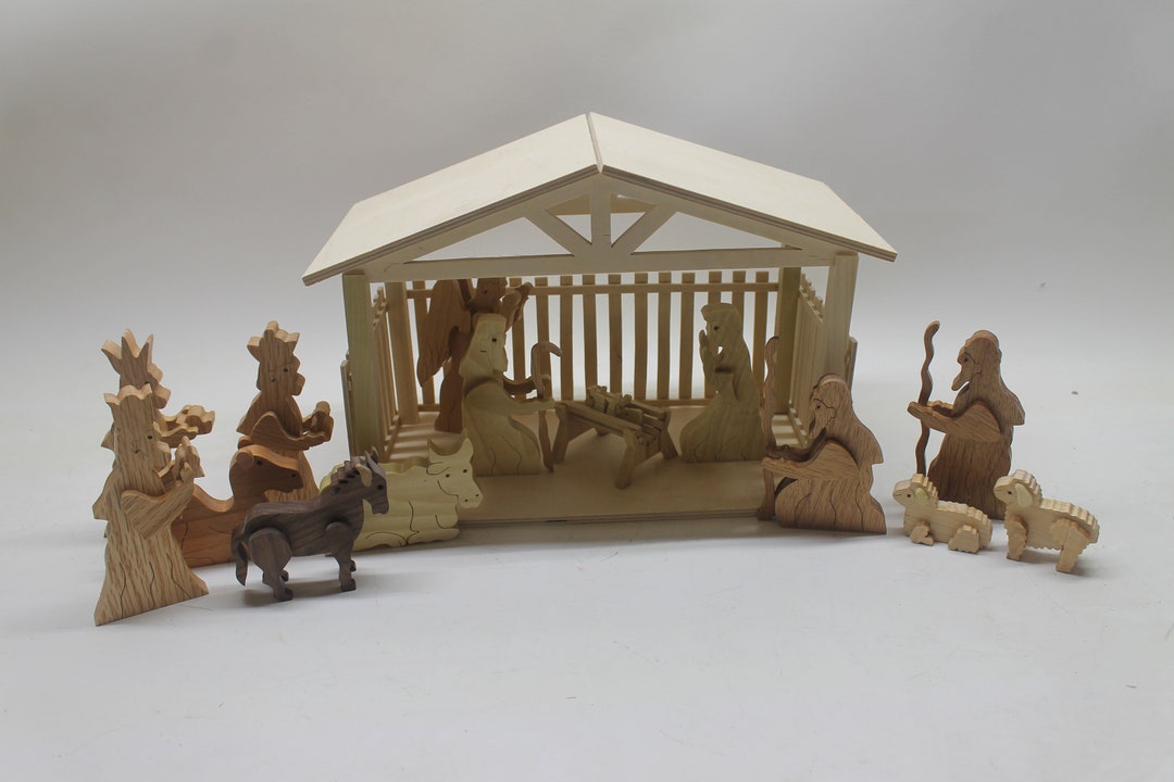 Large scale nativity set with figures that include Mary, Joseph, baby ...