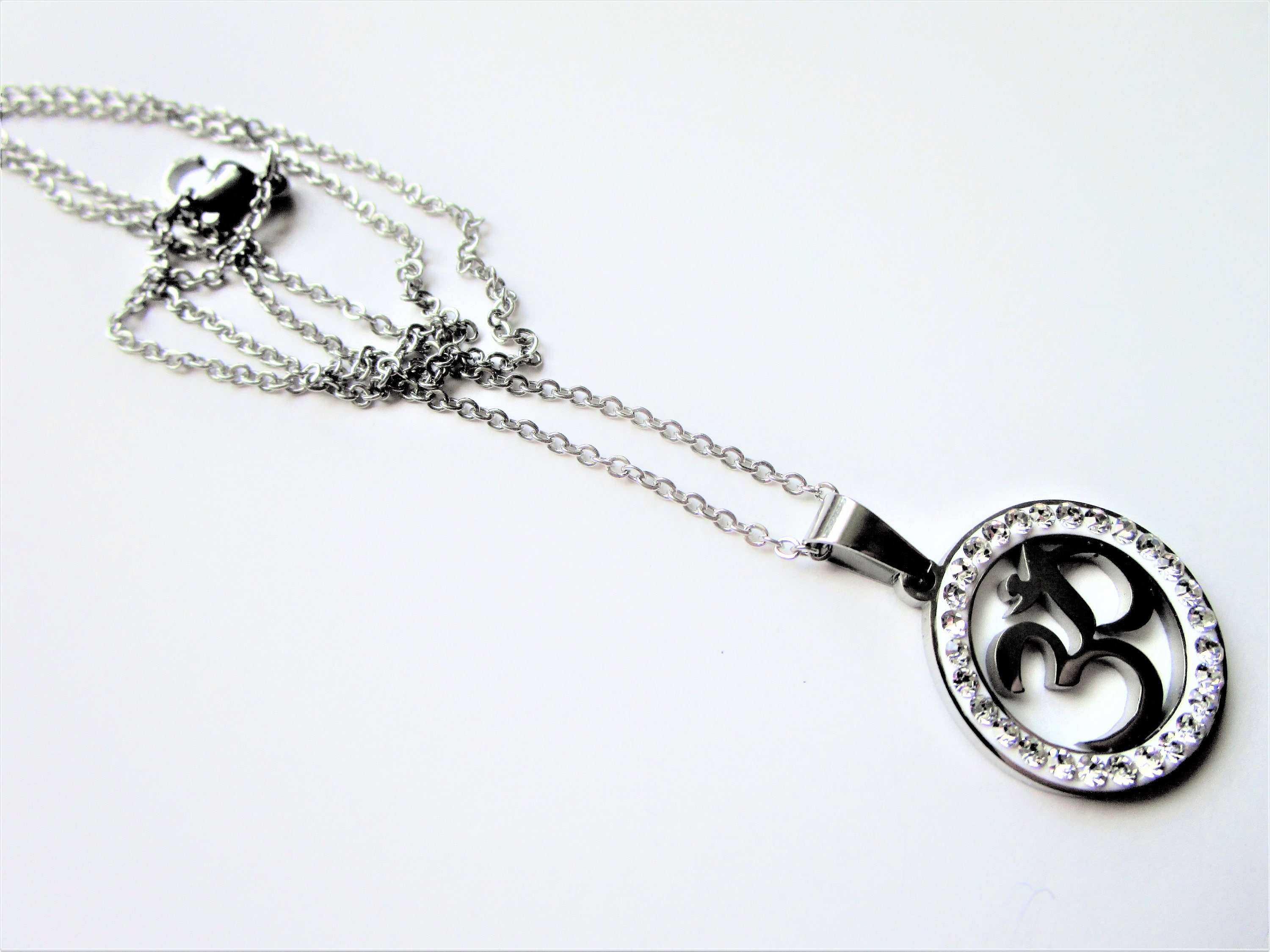 Ohm Symbol Pendant - Round Bejeweled Ohm Symbol Pendant - Stainless ...