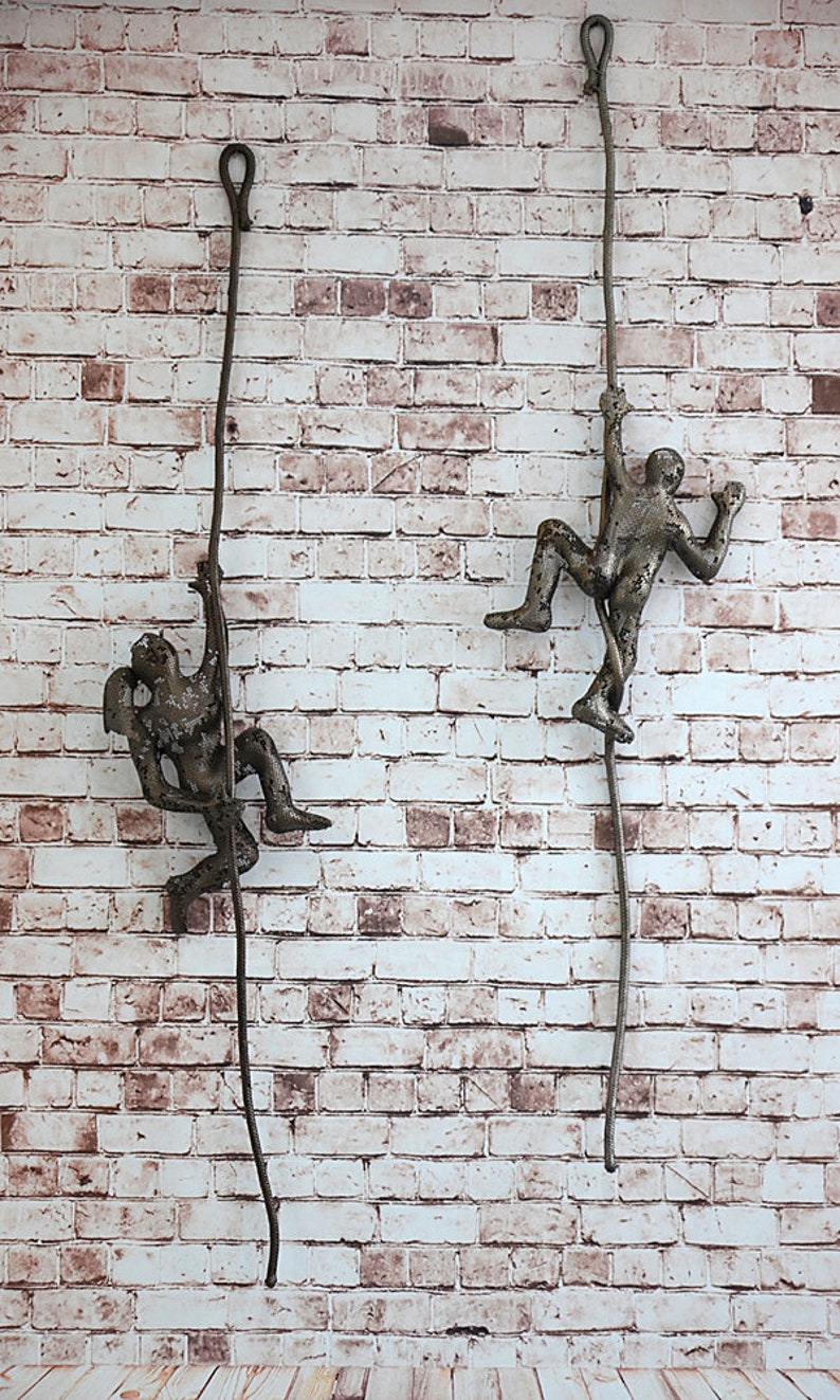 Miniature metal sculpture Climbing man on the rope Wall | Etsy