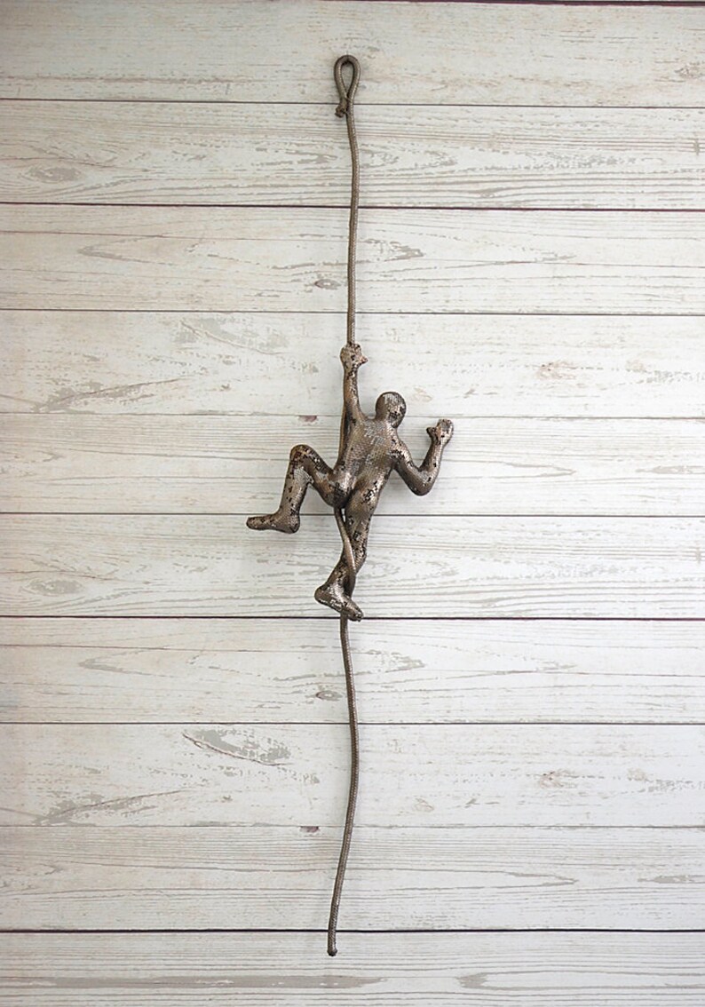 Miniature metal sculpture Climbing man on the rope Wall | Etsy