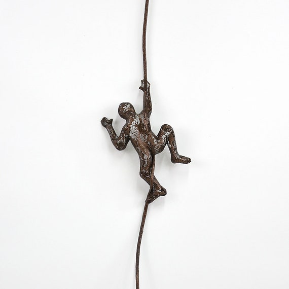 Metal sculpture Miniature climbing man sculpture on rope | Etsy
