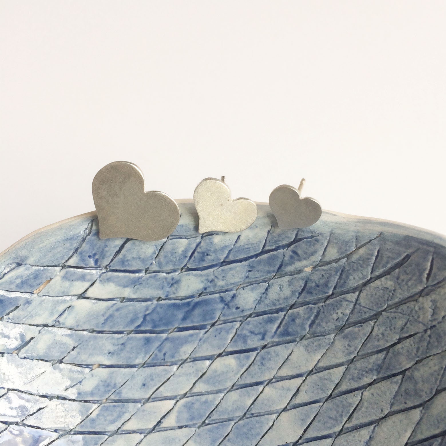 Three silver hearts stud earrings - three different sizes heart ...