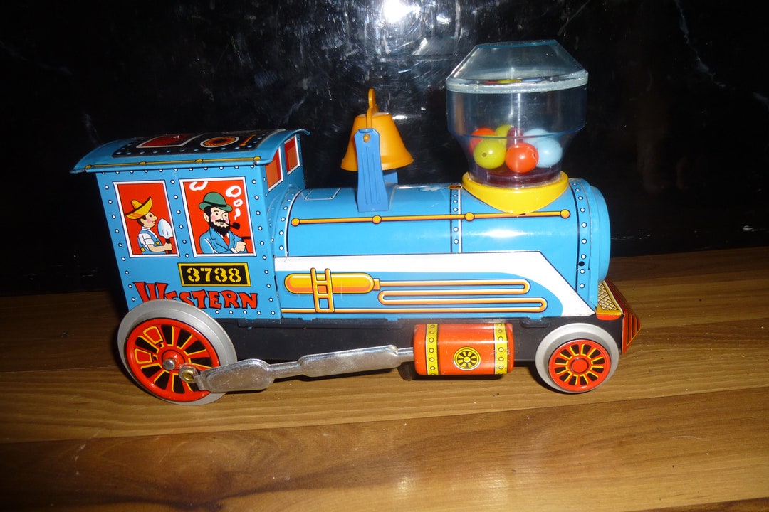 Delightful Tin Toy Train With Light up Marble Popping Smokestack ...