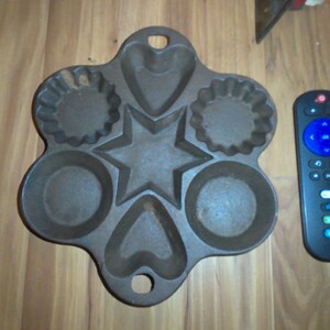 Cast Iron Cornbread and Muffin Pan - Makes 6 Heart and Medal Shapes 2. ...