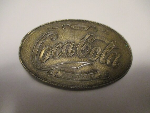 Coca-Cola at Fountains - vintage brass belt buckle ad… - Gem