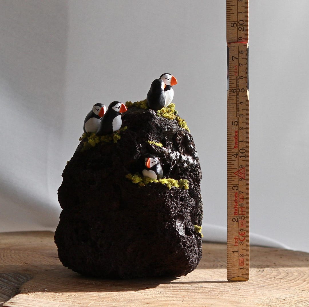 Small Puffins Sculptures on a Lava Rock. Designed and Made by Icelandic ...