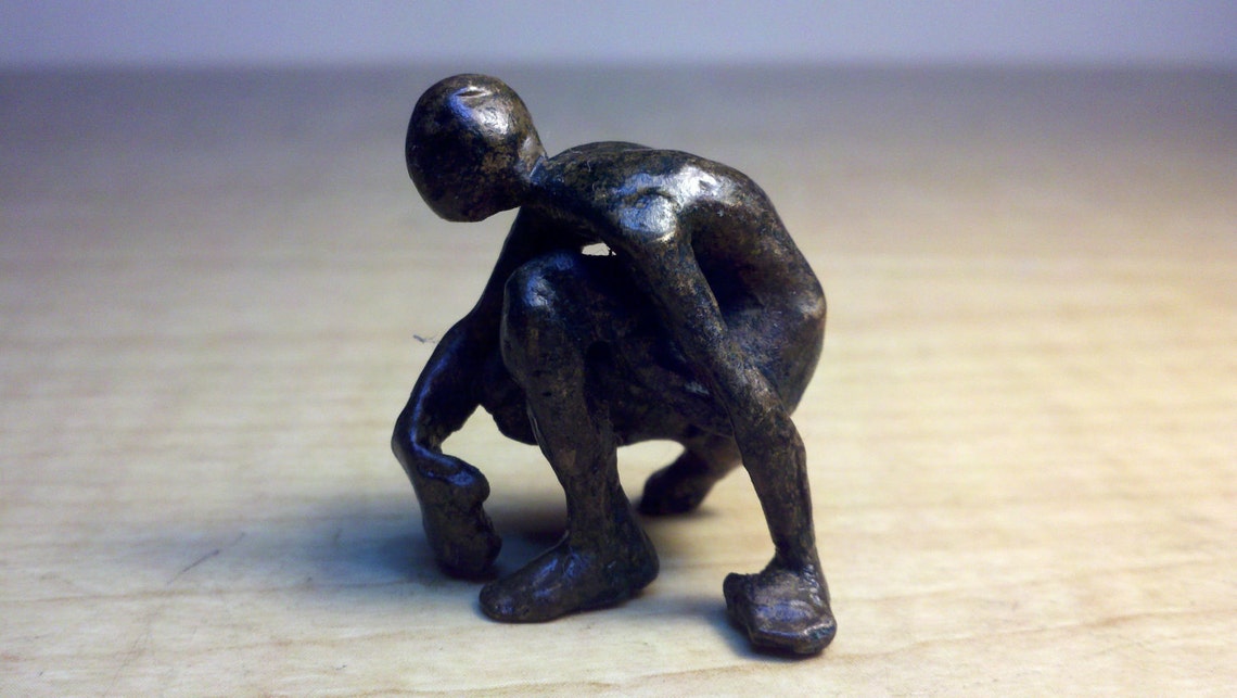 Bronze sculpture crouching Small figure | Etsy