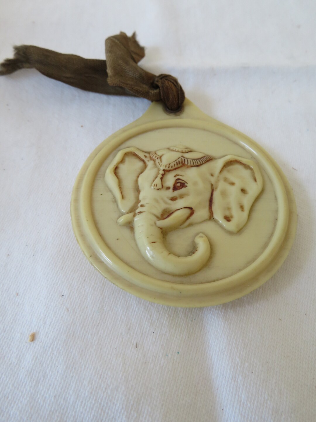 Vintage/antique Celluloid Mirror Locket With Carved Elephant to the ...