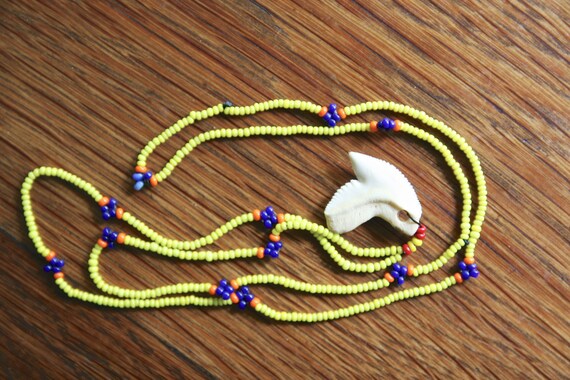 Vintage yellow, red, and blue bead string necklace wi… - Gem