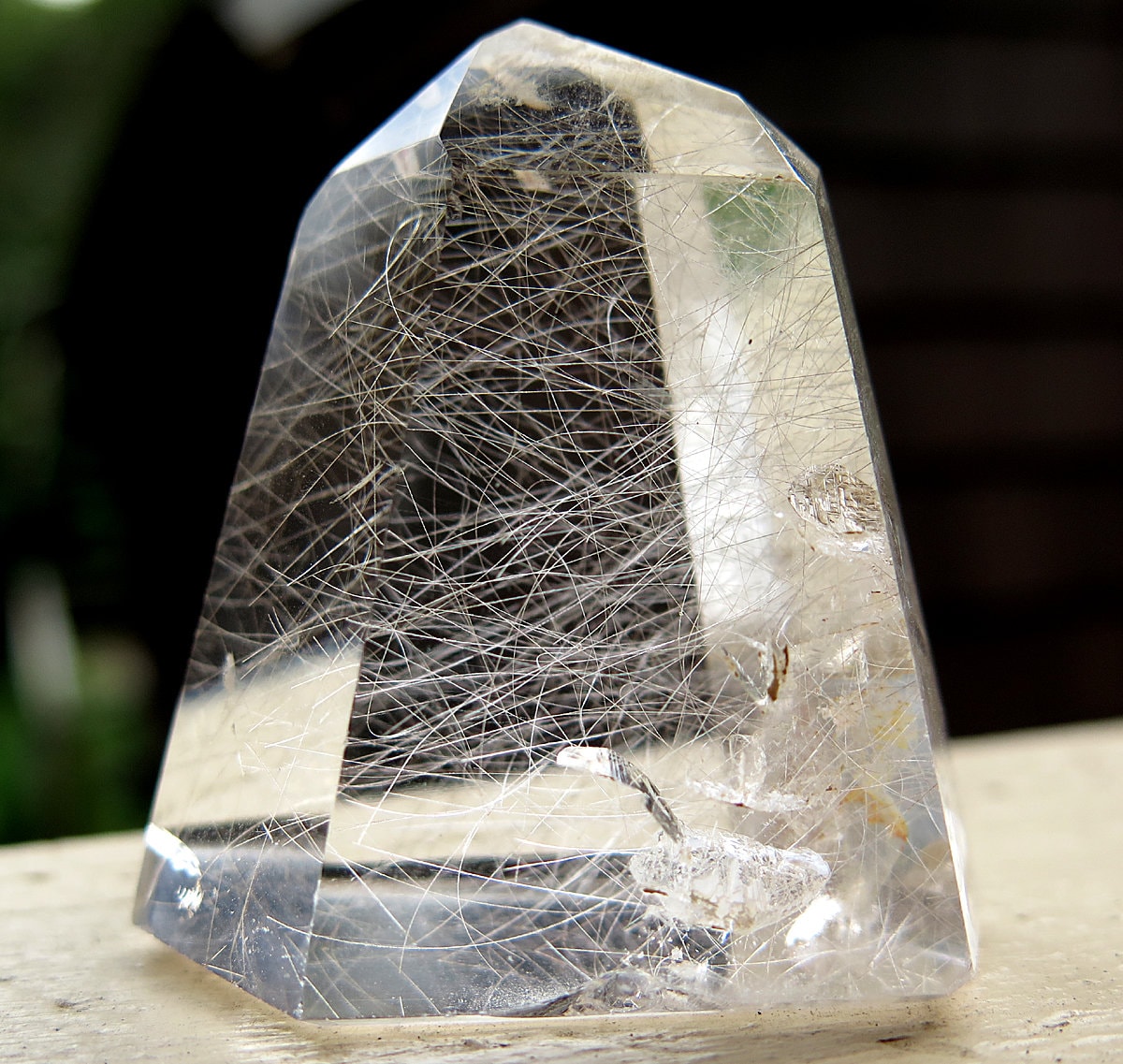 84 Gram silver rutile included quartz polished point. Good size, Brazil.