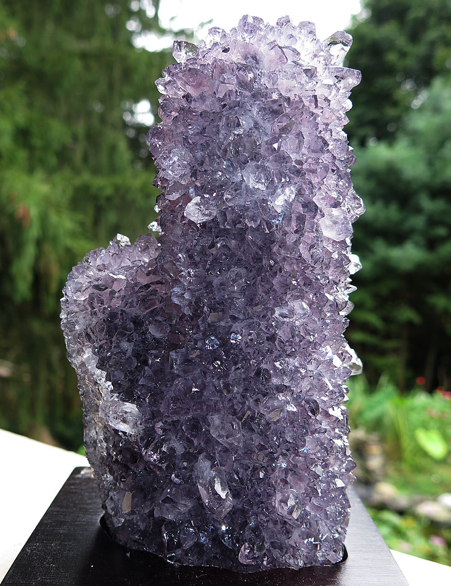 A beautiful Lavender Amethyst Stalactite with polished eyes. Stand ...