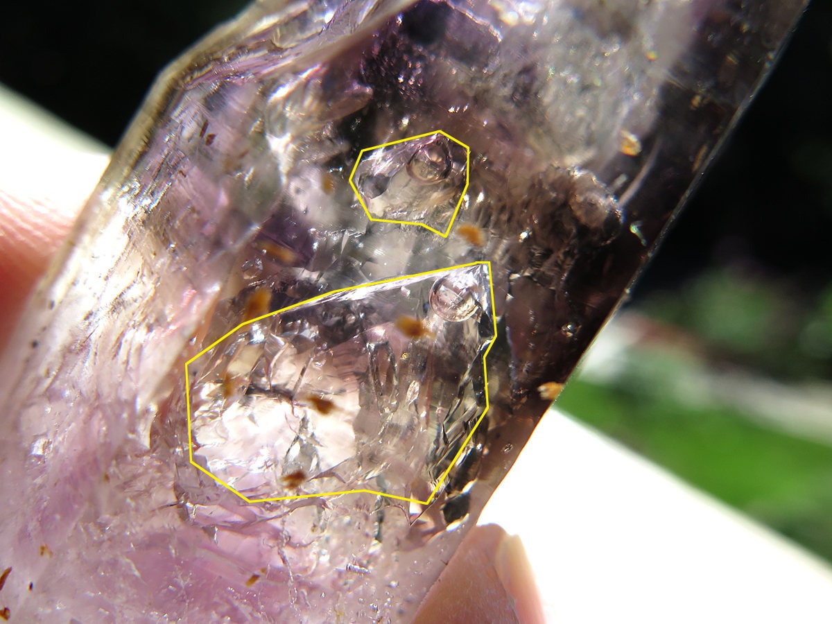 A ultimate Smoky Amethyst Enhydro Crystal 2 bubbles moving. 1 moves BIG ...