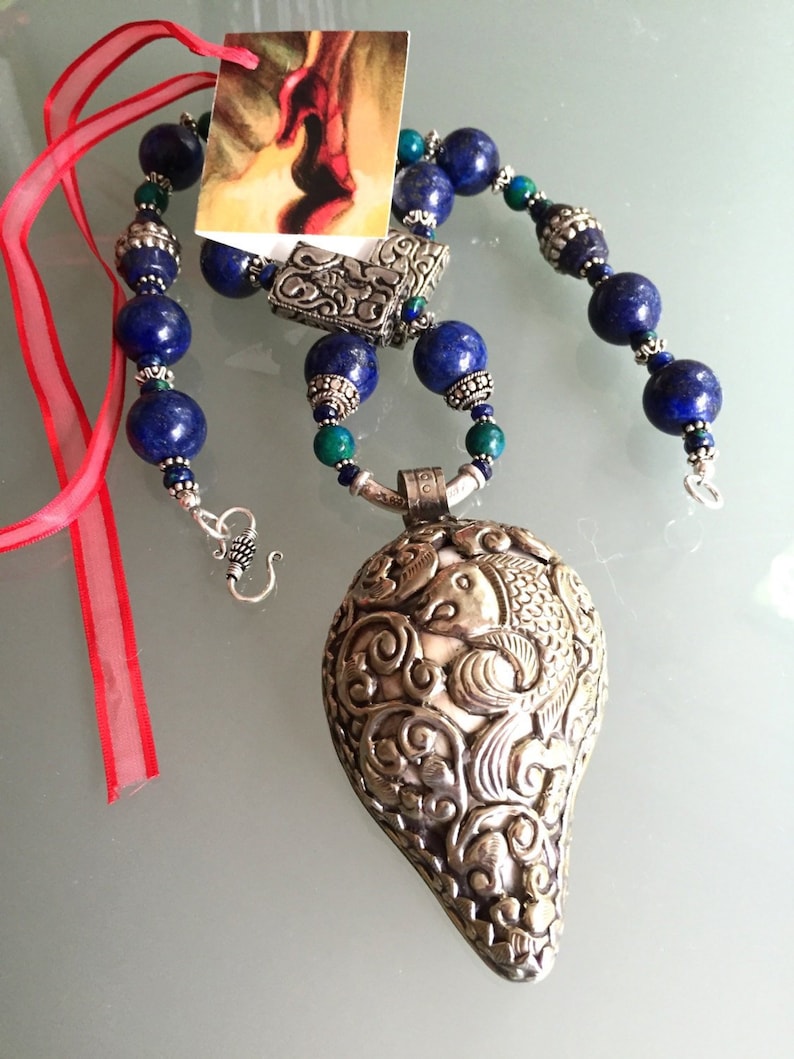 Pema Tibetan Silver Repousse Covered Sacred Chank Shell Pendant ...