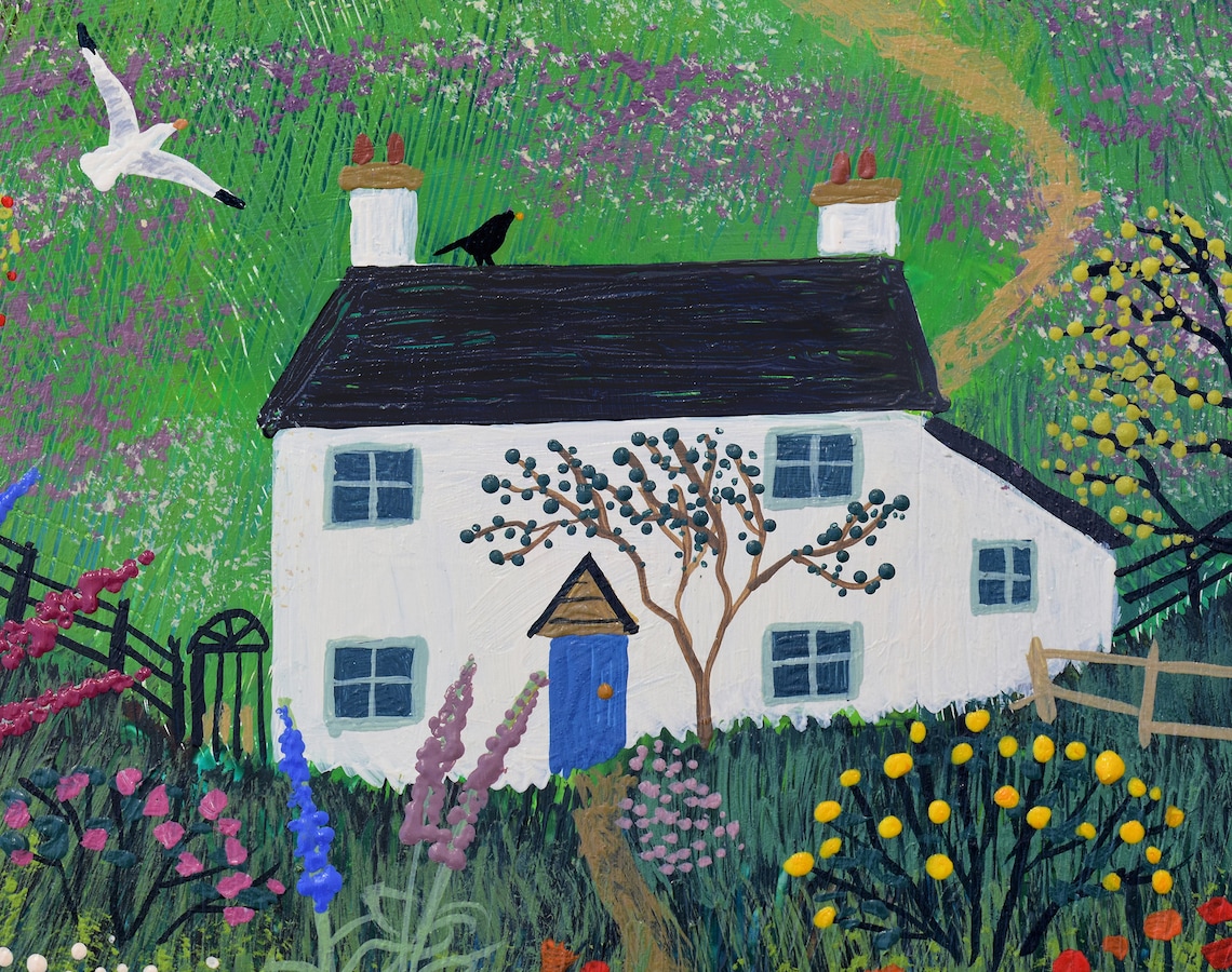Canvas Print of a White Cottage by the Sea With Lighthouse From an ...
