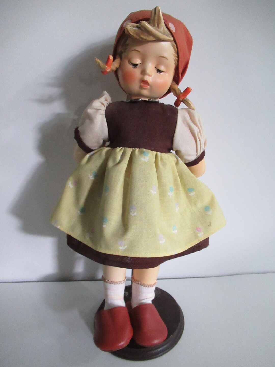 Goebel Aus Dem Hause Doll With Pigtails and Scarf Flowers Behind Back ...