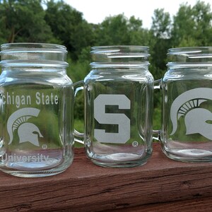 Pair of MSU Spartan Officially Licensed Etched Glasses – 16 Oz Mason ...