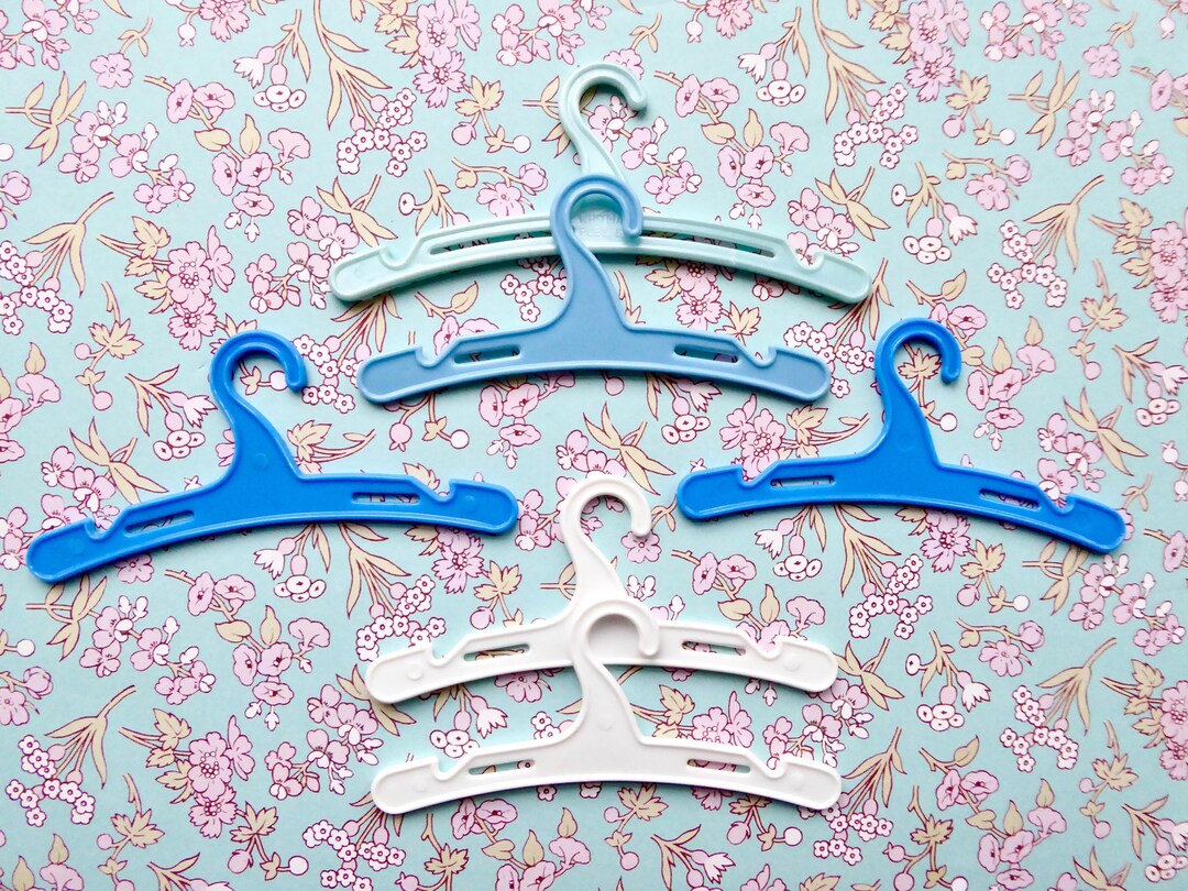 MIXED DOLL HANGERS, a Vintage Group of Six, Primarily in Blue Shades ...