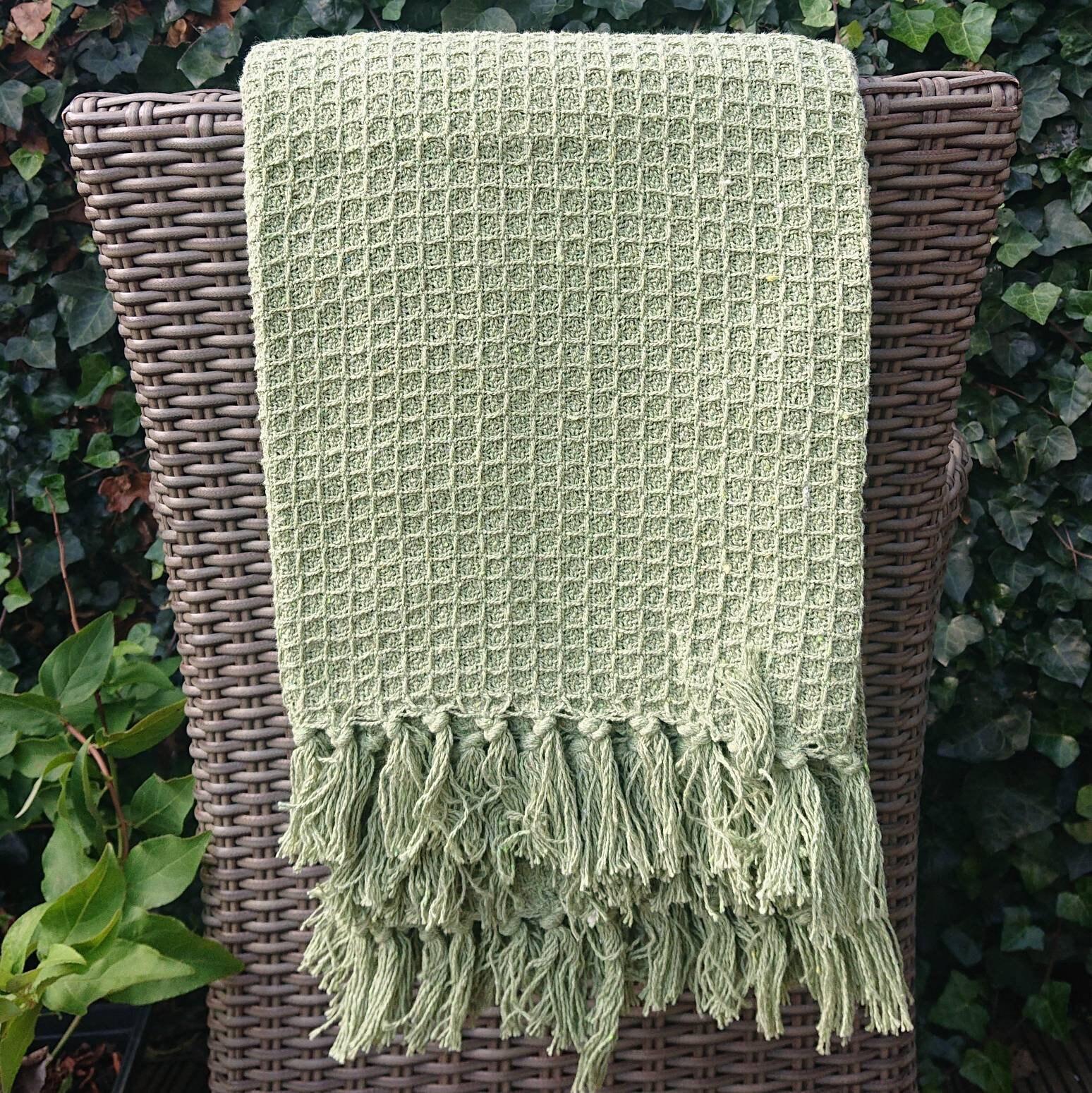 Recycled cotton waffle blanket with personalised embroidery.