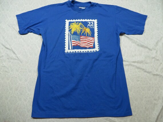 Vintage Flag Stamp Tee Shirt Blue Postage 22 Cents Ha… - Gem