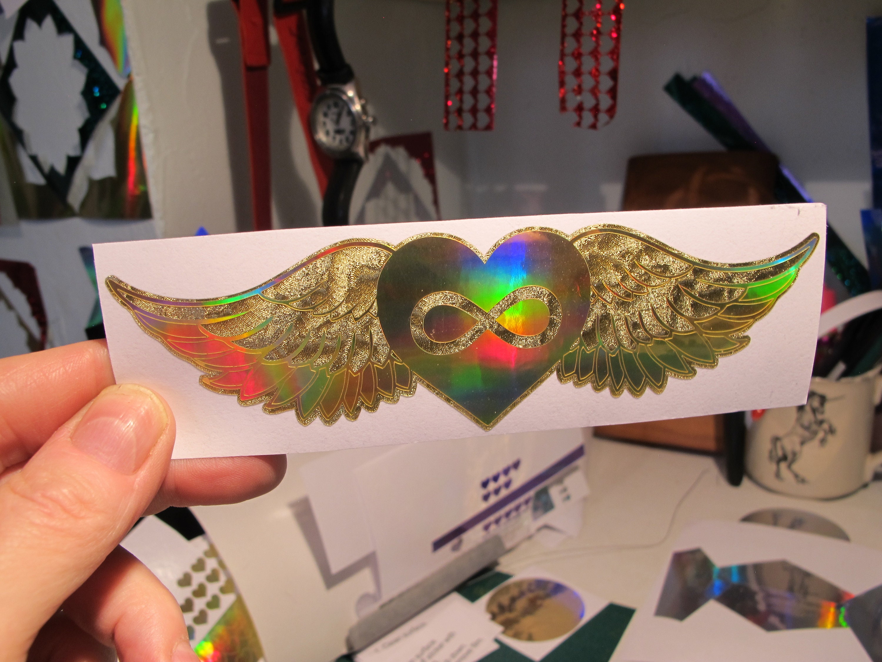 WINGED HEART Vinyl Sticker/ Window Decal. Prismatic Rainbow Silver or ...
