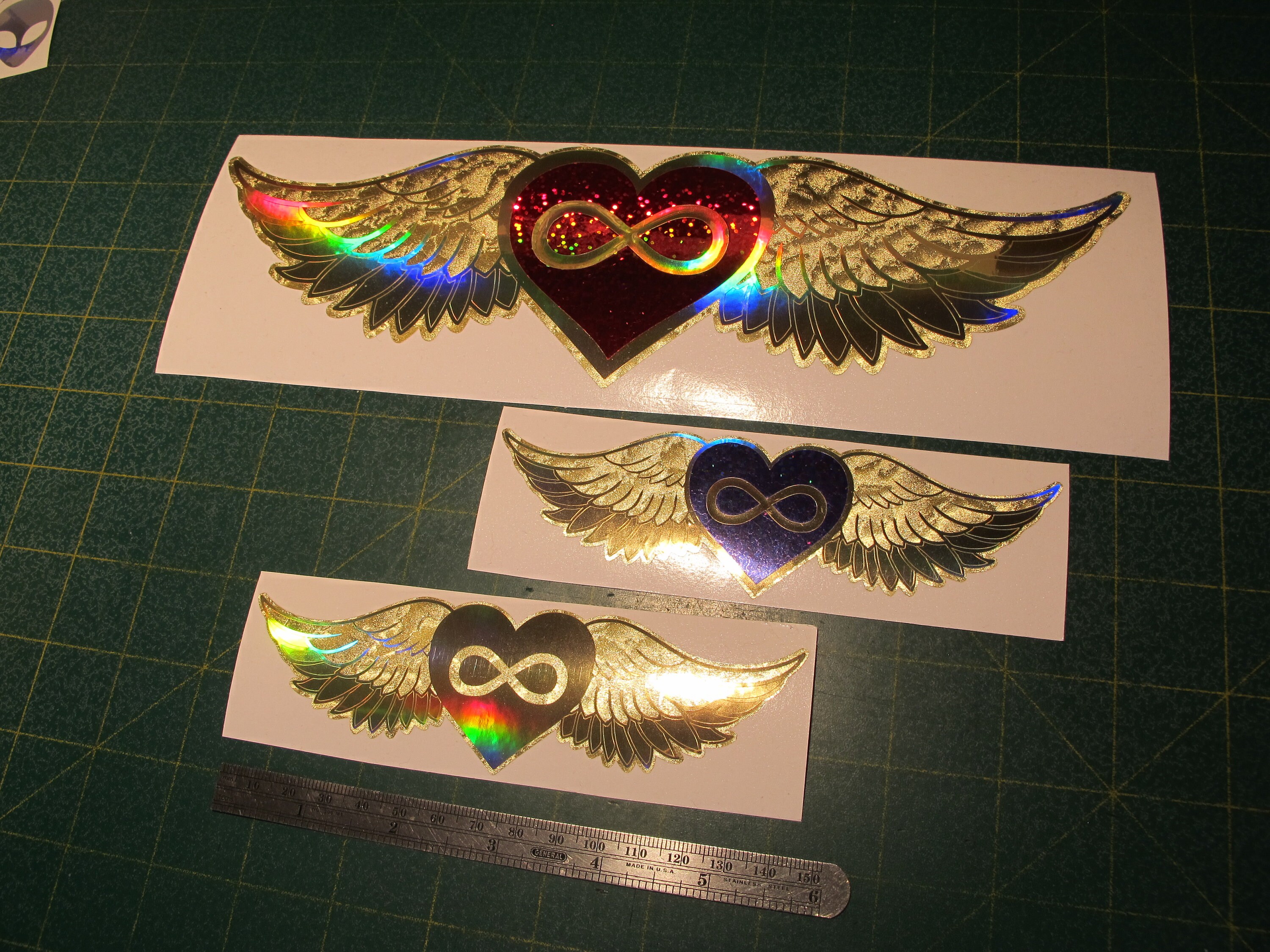 WINGED HEART Vinyl Sticker/ Window Decal. Prismatic Rainbow Silver or ...