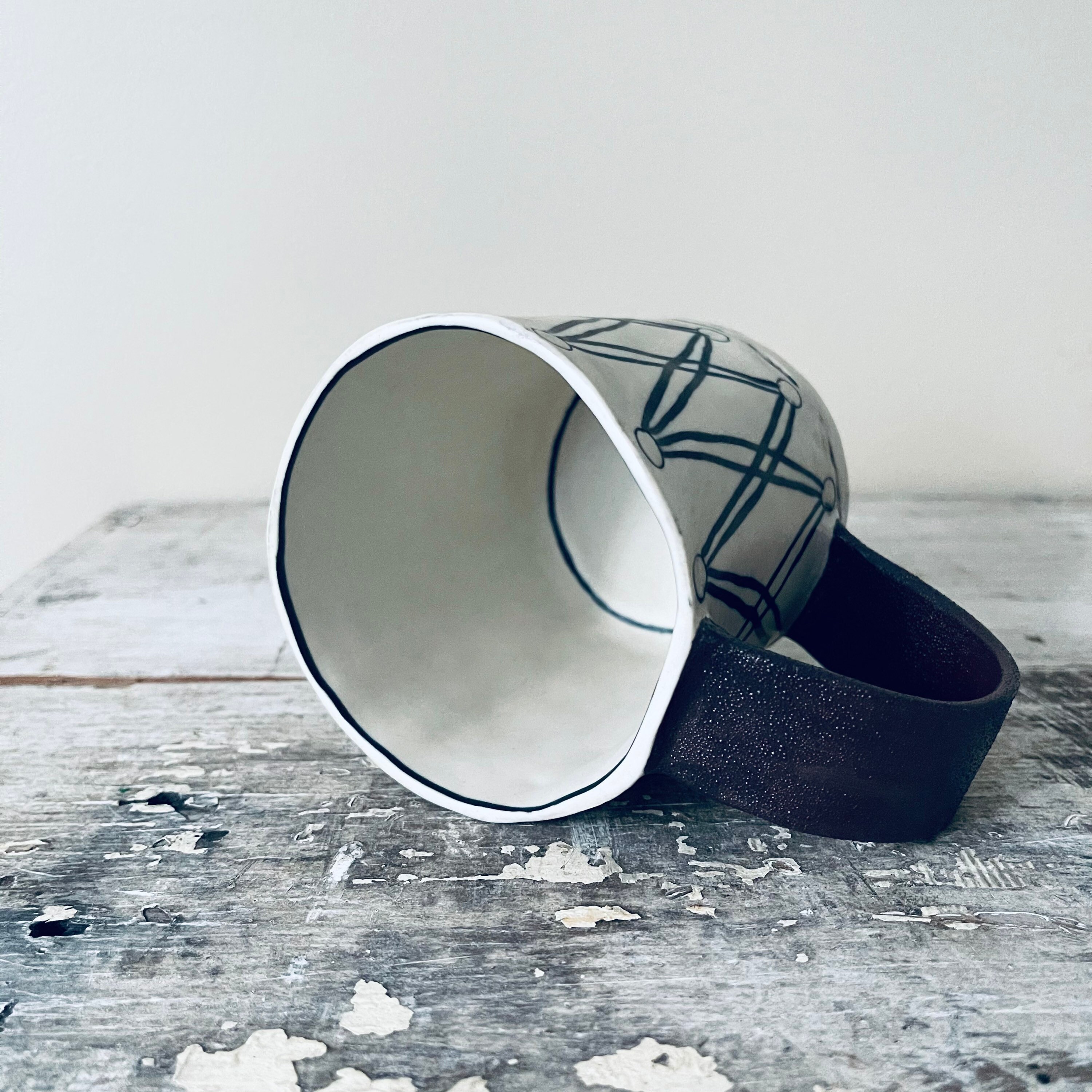 Hand pinched/built stoneware mug with leathery handle | Etsy