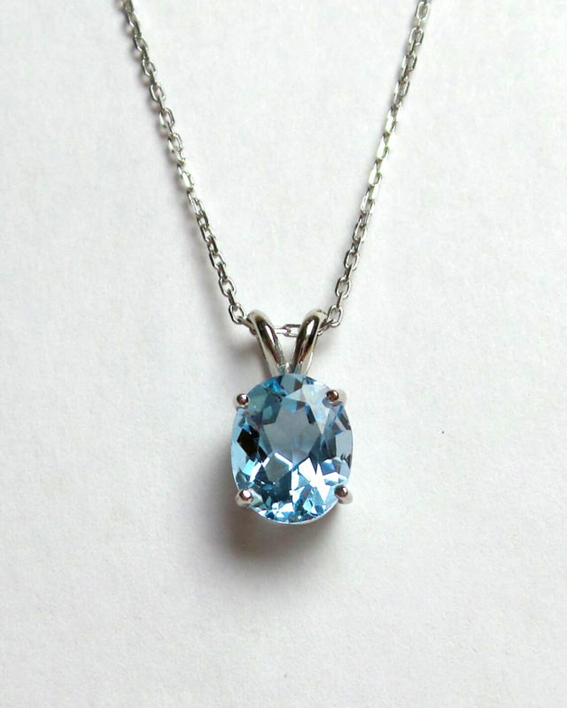 Sky Blue Topaz Necklace: Oval Gemstone, Sterling Silver, December ...