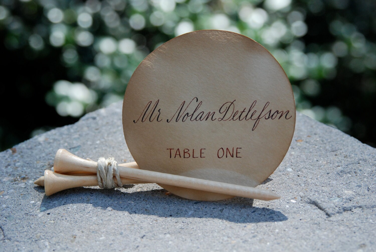 Hand Calligraphy on Tea Stained Circular Escort Cards - Wedding Place ...