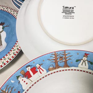 Sakura "snowman" Dinnerware. Designed by Debbie Mumm 1997. 16-piece ...