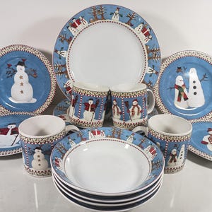 Sakura "snowman" Dinnerware. Designed by Debbie Mumm 1997. 16-piece ...