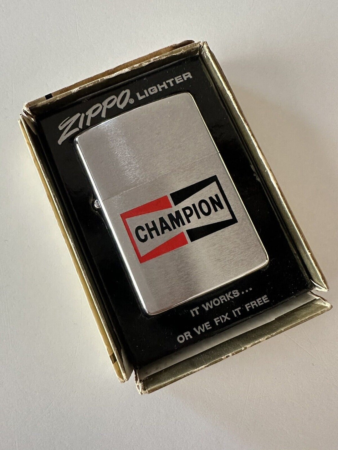 1974 Unstruck NOS Champion Spark Plugs Zippo Lighter W Box Brushed ...