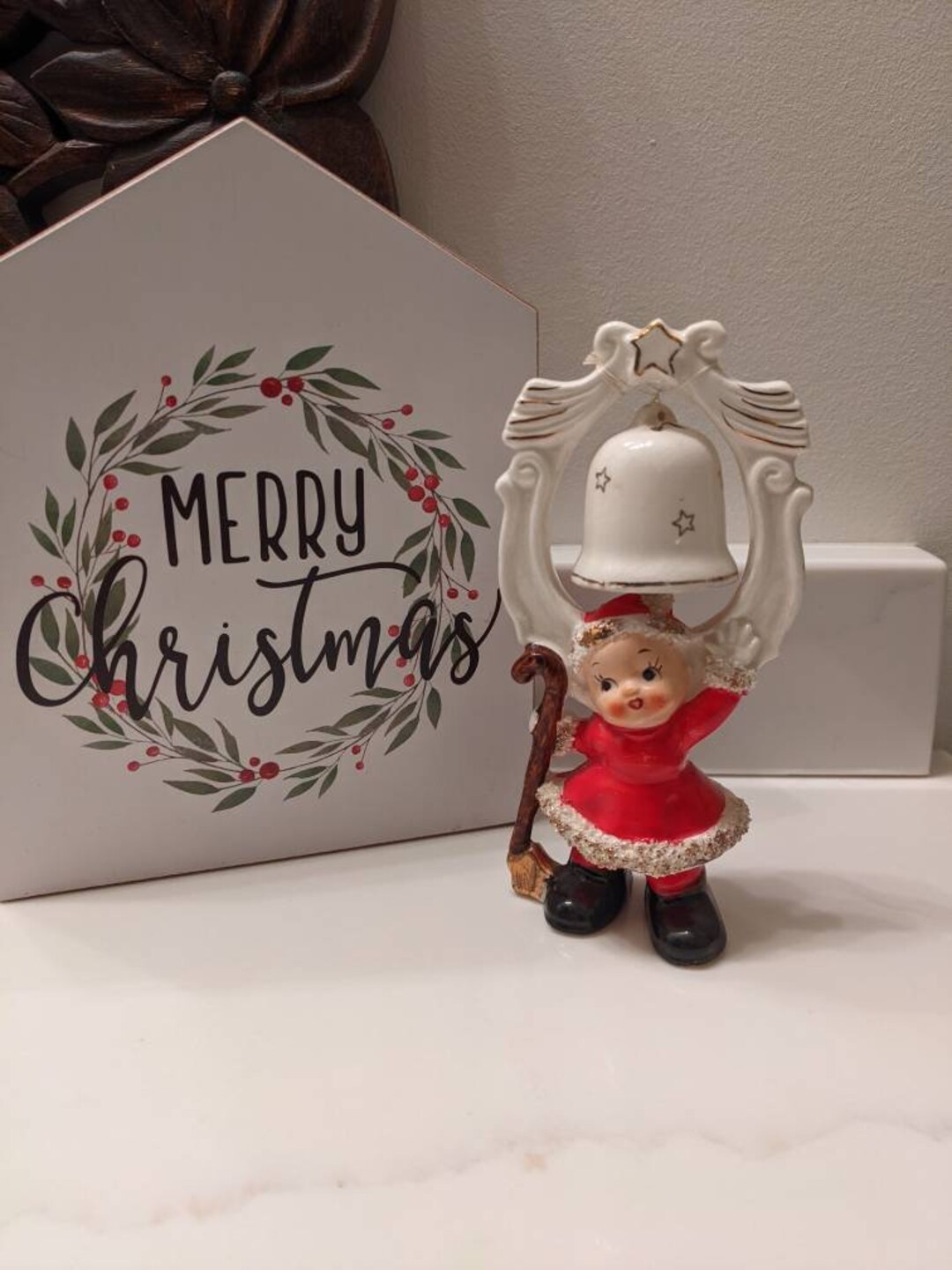 Thames Santa 's Helper Pixie Wears a Santa Suit Stands Under a Star ...