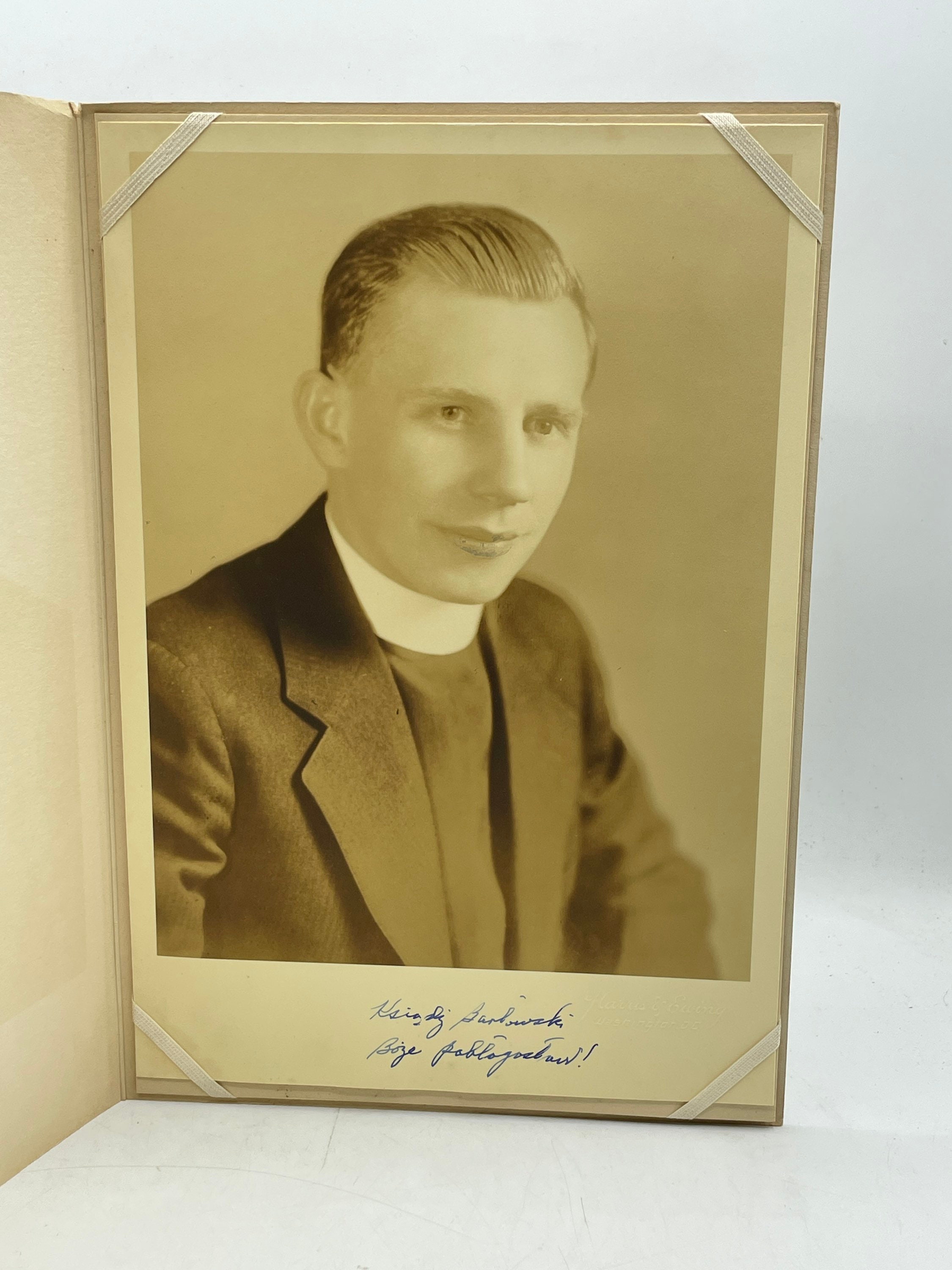 White And Black Catholic Priest