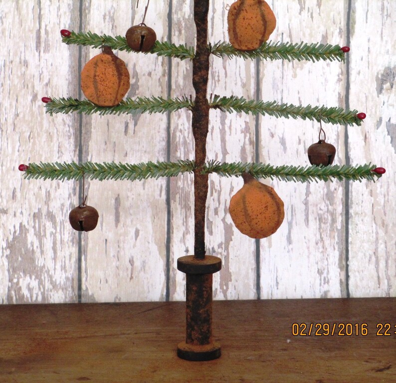 Primitive Faux German Single Feather Tree with rusty star and | Etsy