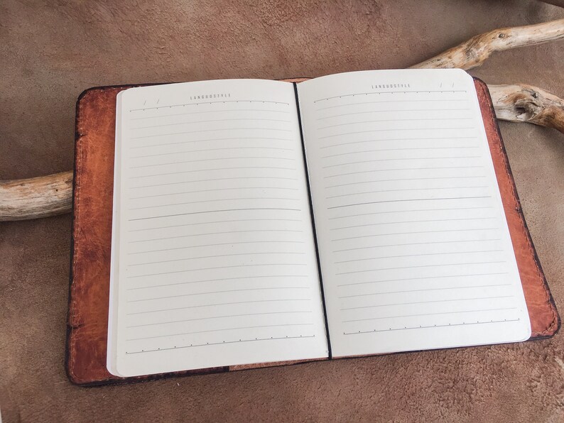 Just got this handmade Joker journal cover through the mail! Can't wait ...