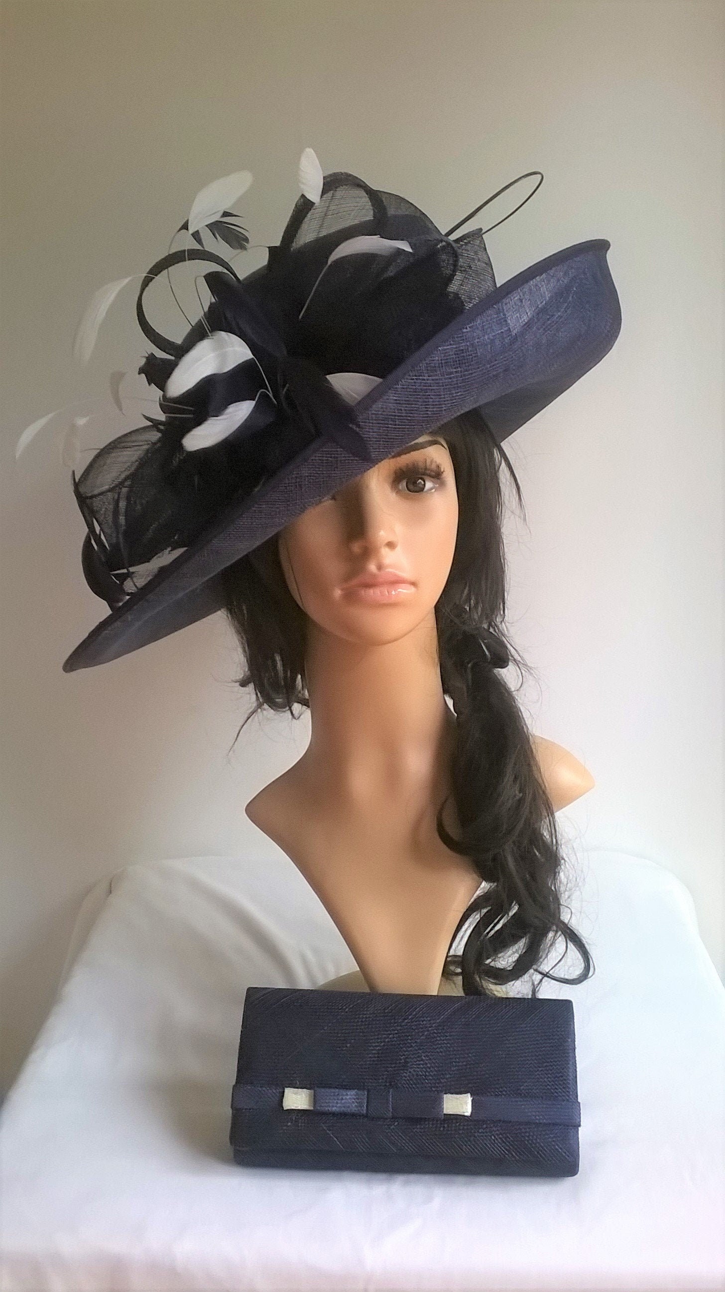 Gorgeous Statement Hat..Stunning Sinamay Hat ..with Bow ,swirls loops ...