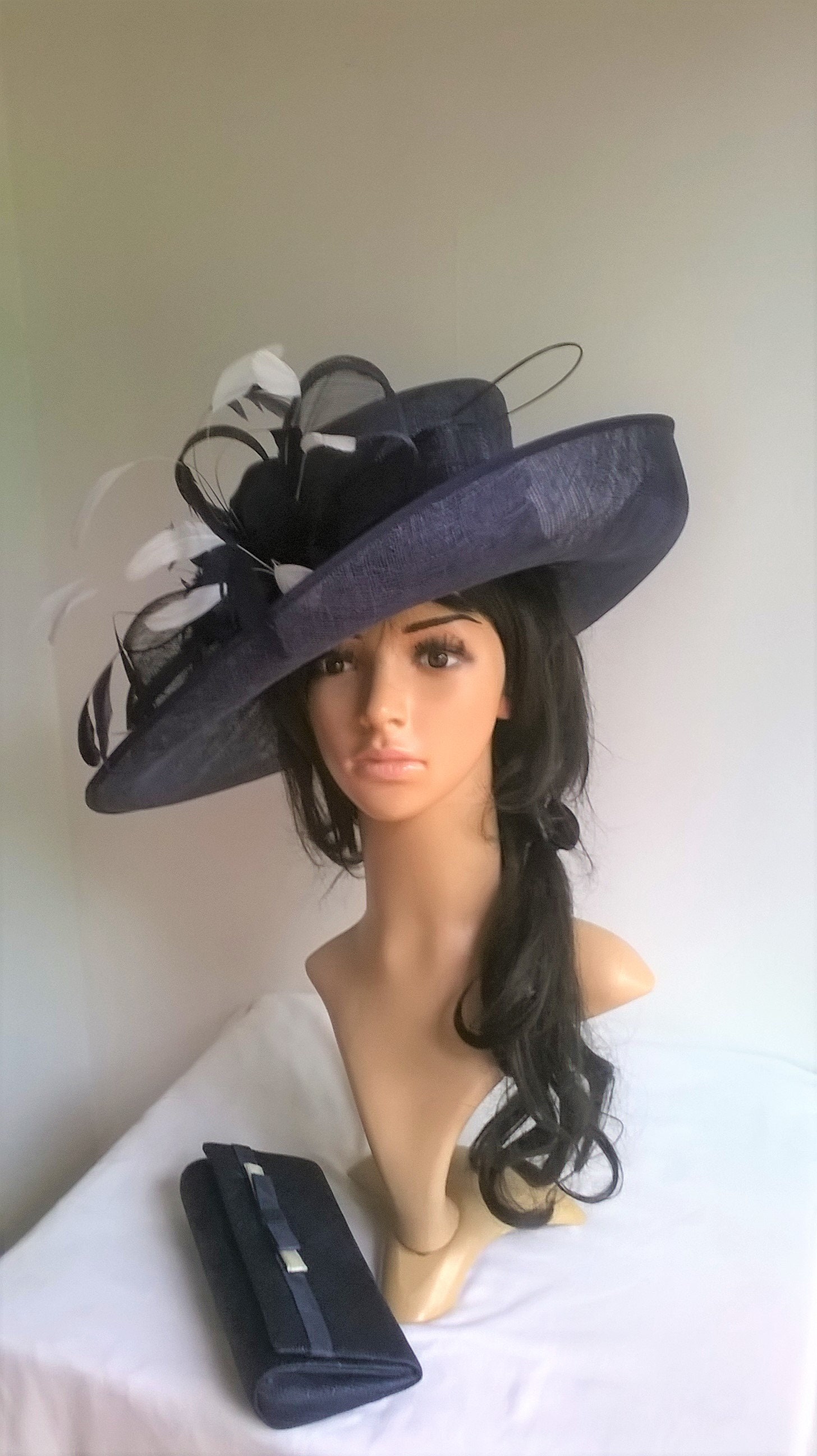 Gorgeous Statement Hat..Stunning Sinamay Hat ..with Bow ,swirls loops ...