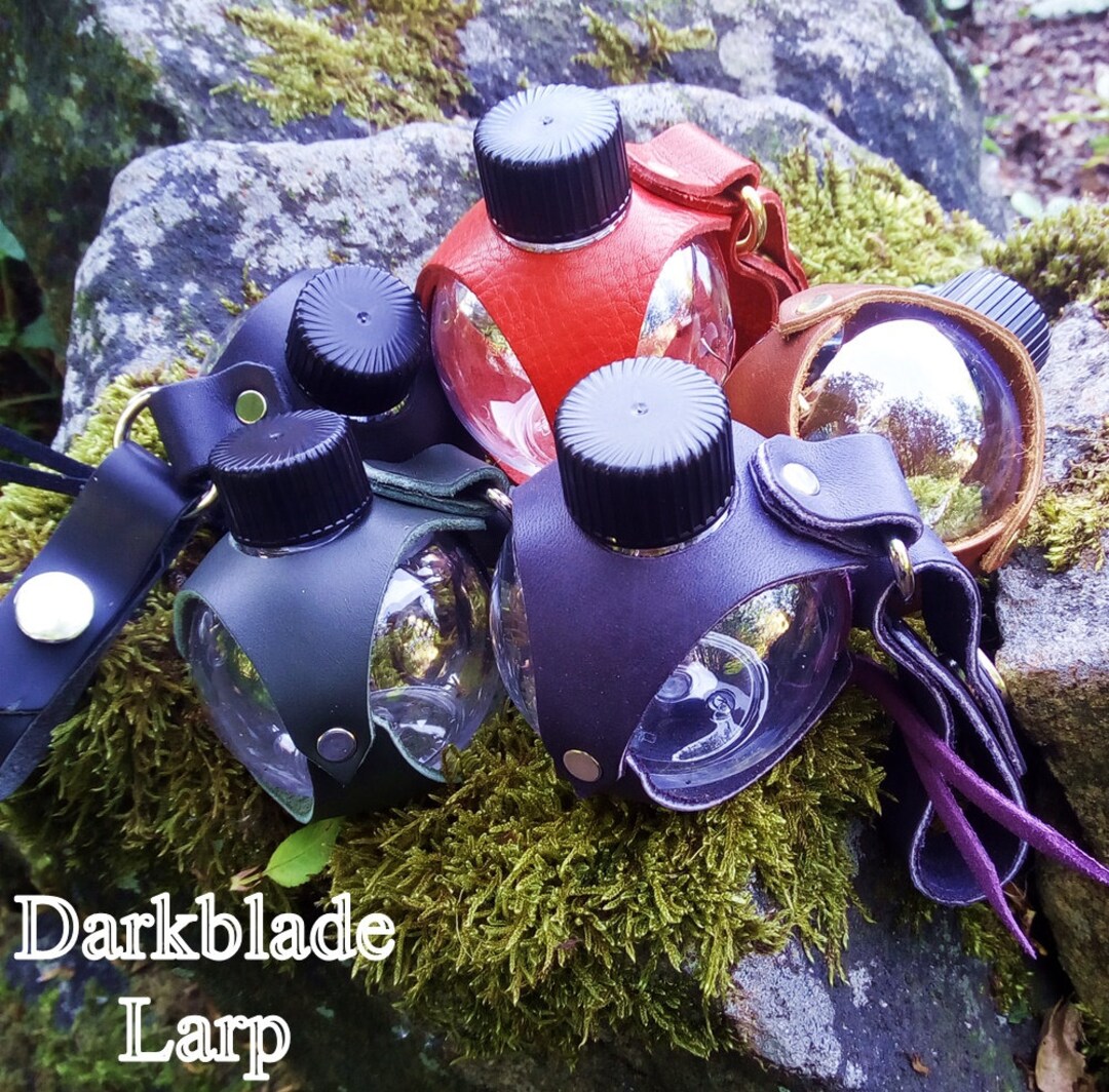 Small Plastic Potion Bottles in a Carrier You Can Unclip From Your Belt ...
