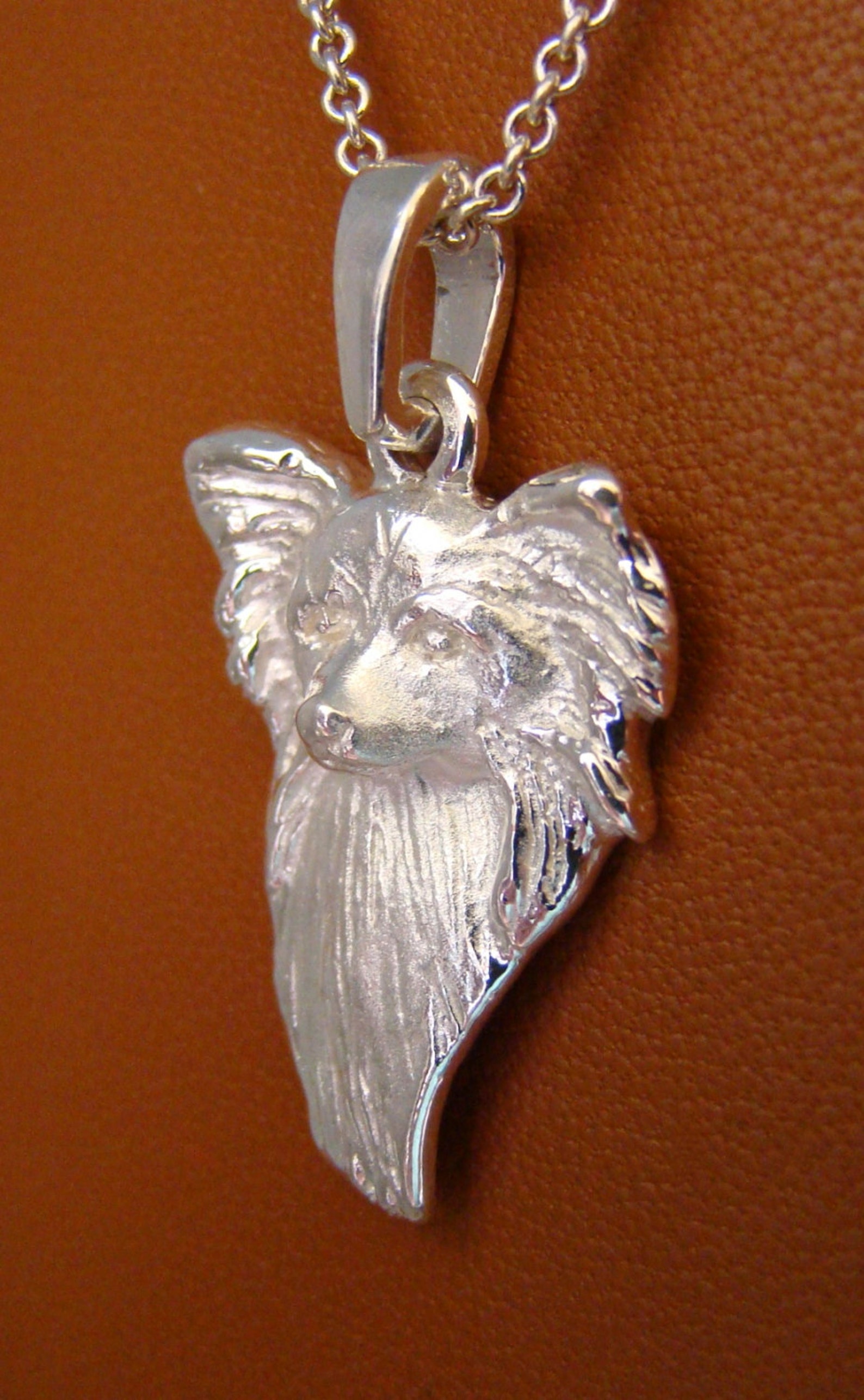 Sterling Silver Papillon Head Study Pendant - Etsy