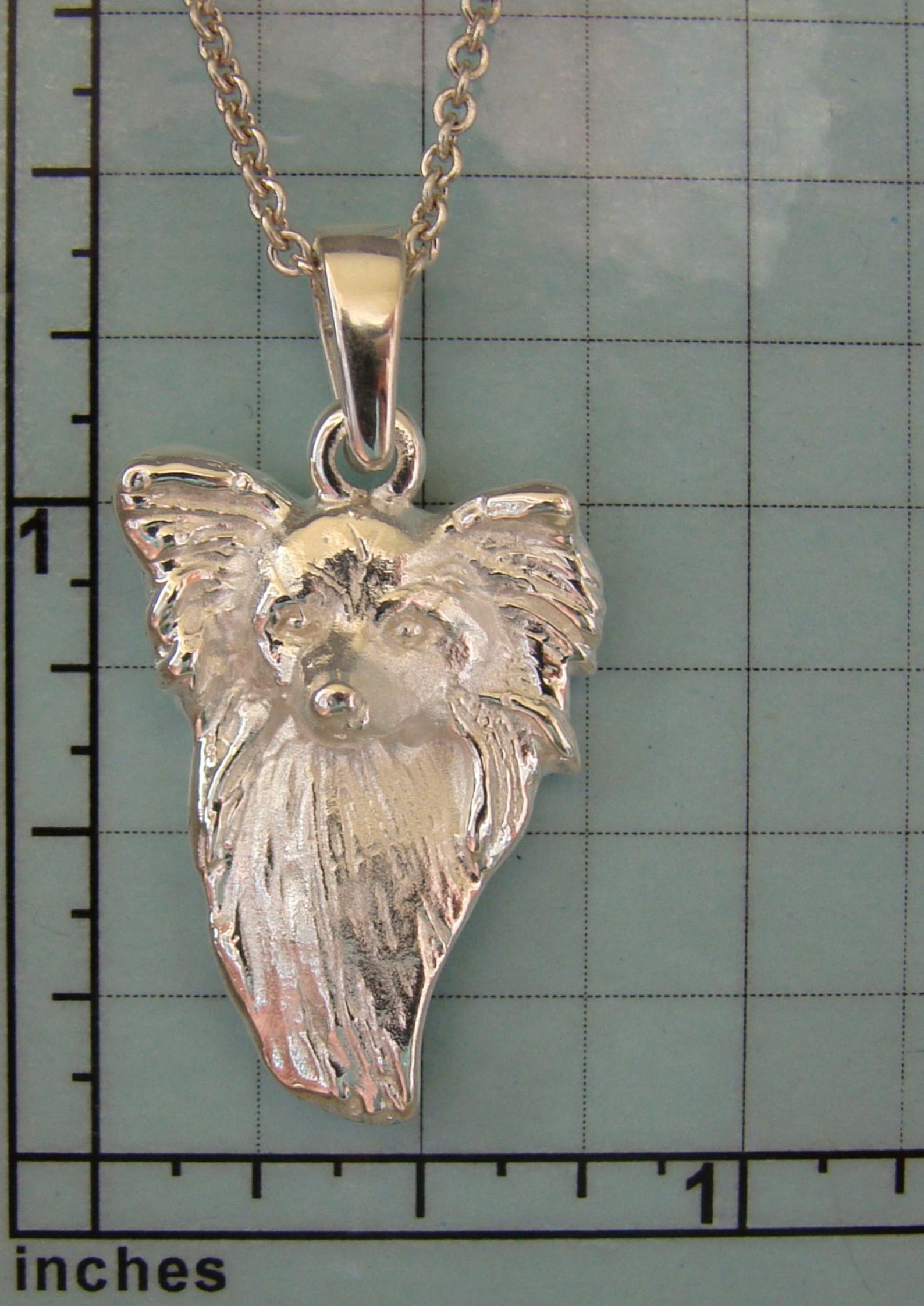 Sterling Silver Papillon Head Study Pendant - Etsy