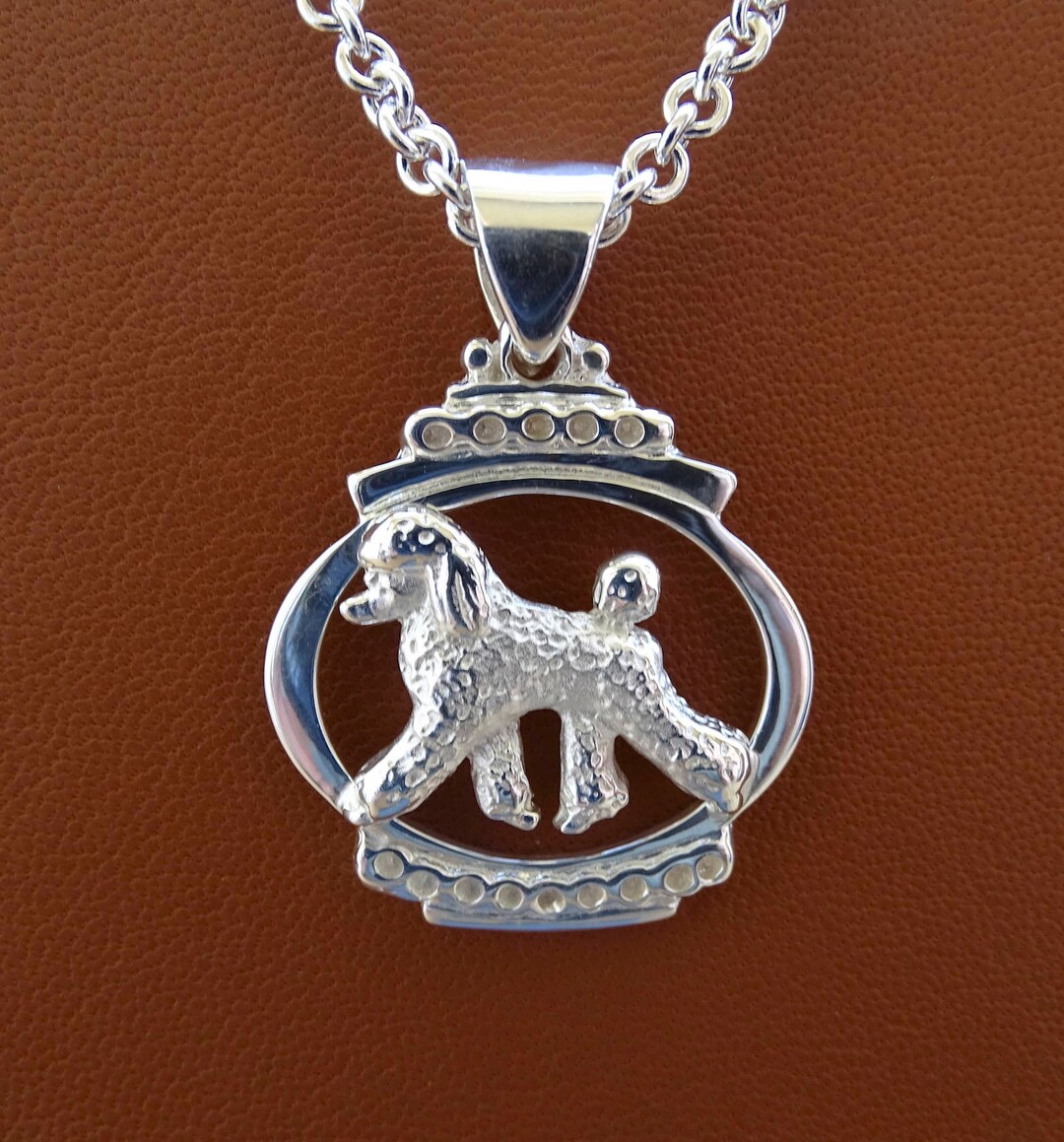 Small Sterling Silver Poodle Moving Study on A Fancy Oval Frame Pendant ...