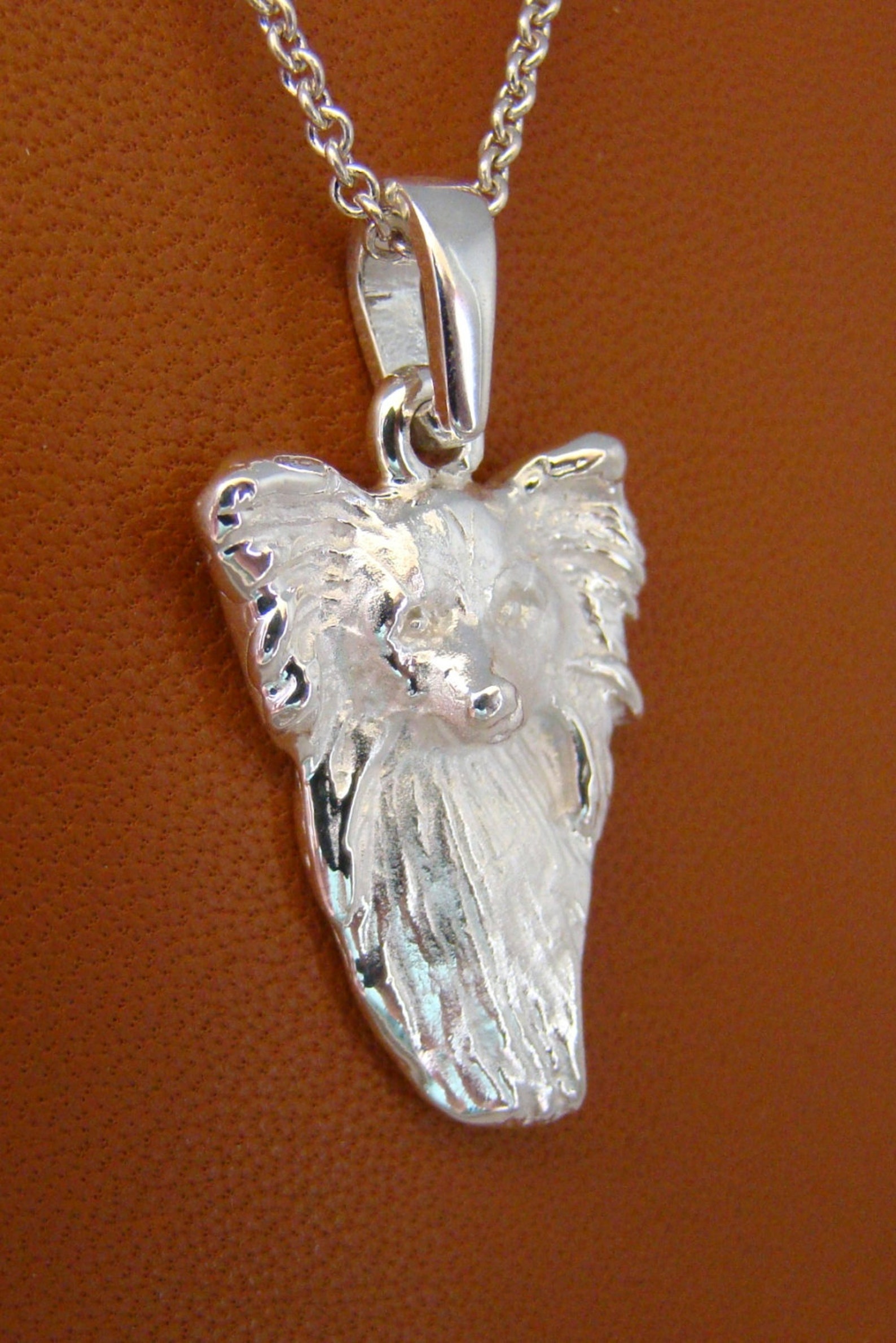 Sterling Silver Papillon Head Study Pendant - Etsy